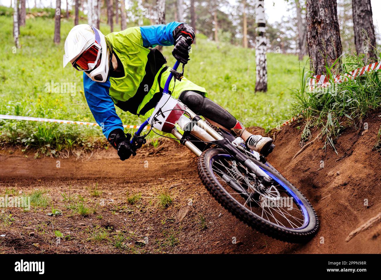 male racer athlete riding cornering turn downhill race, sports summer ...