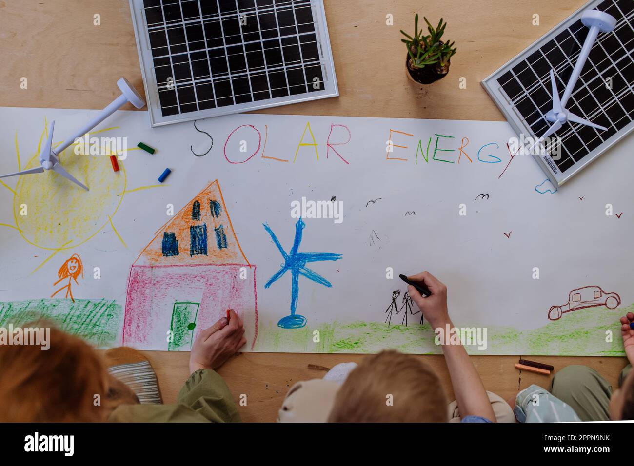 Children drawing a project to environmental lesson Stock Photo - Alamy