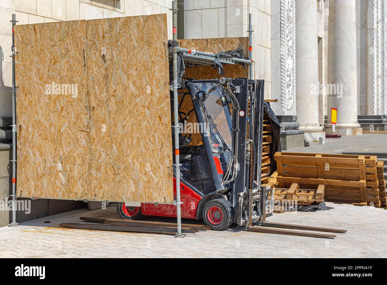 Forklift in Improvised Temporary Garage Made From Particle Boards ...