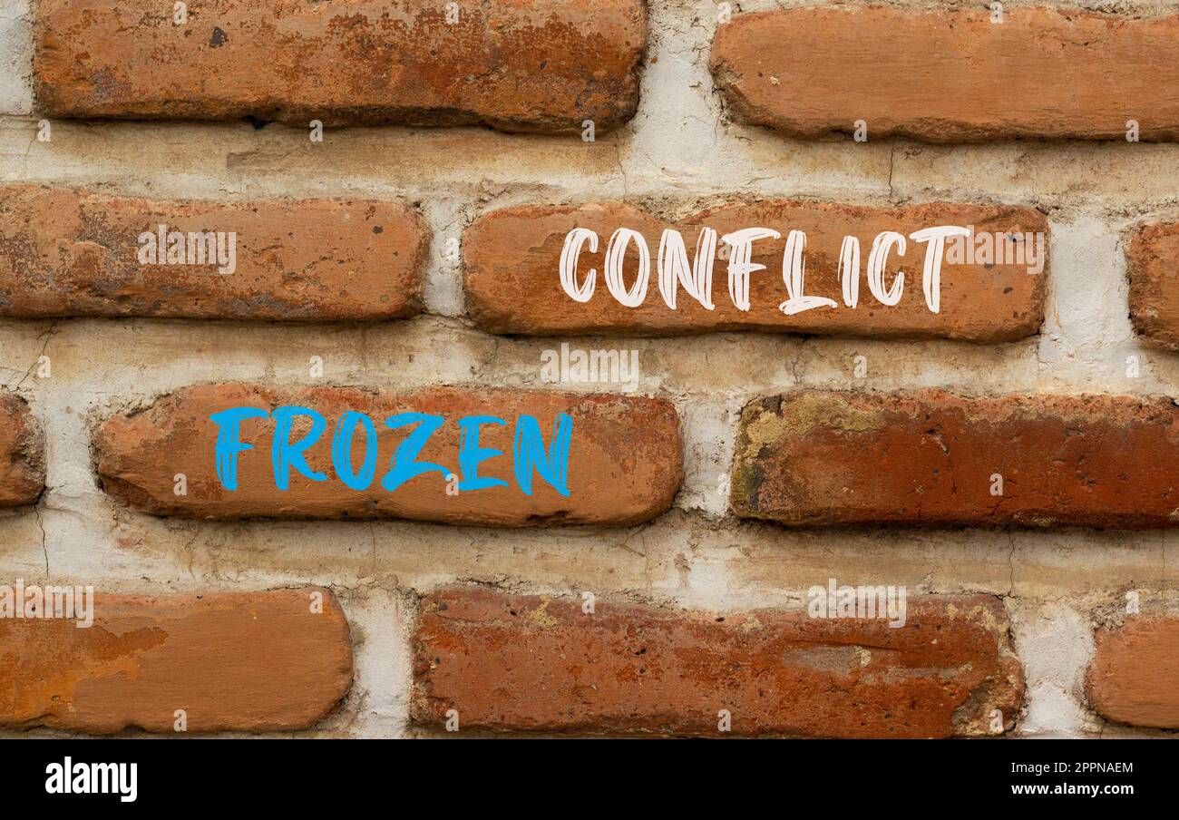 Frozen conflict symbol. Concept words Frozen conflict on beautiful red ...