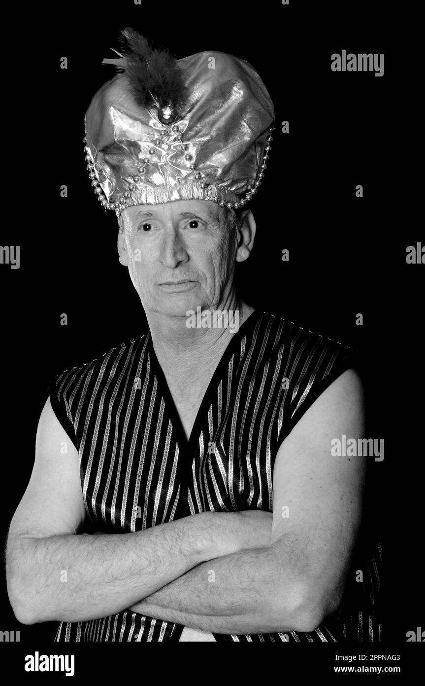 An elder sultan or shiek isolated over black Stock Photo - Alamy