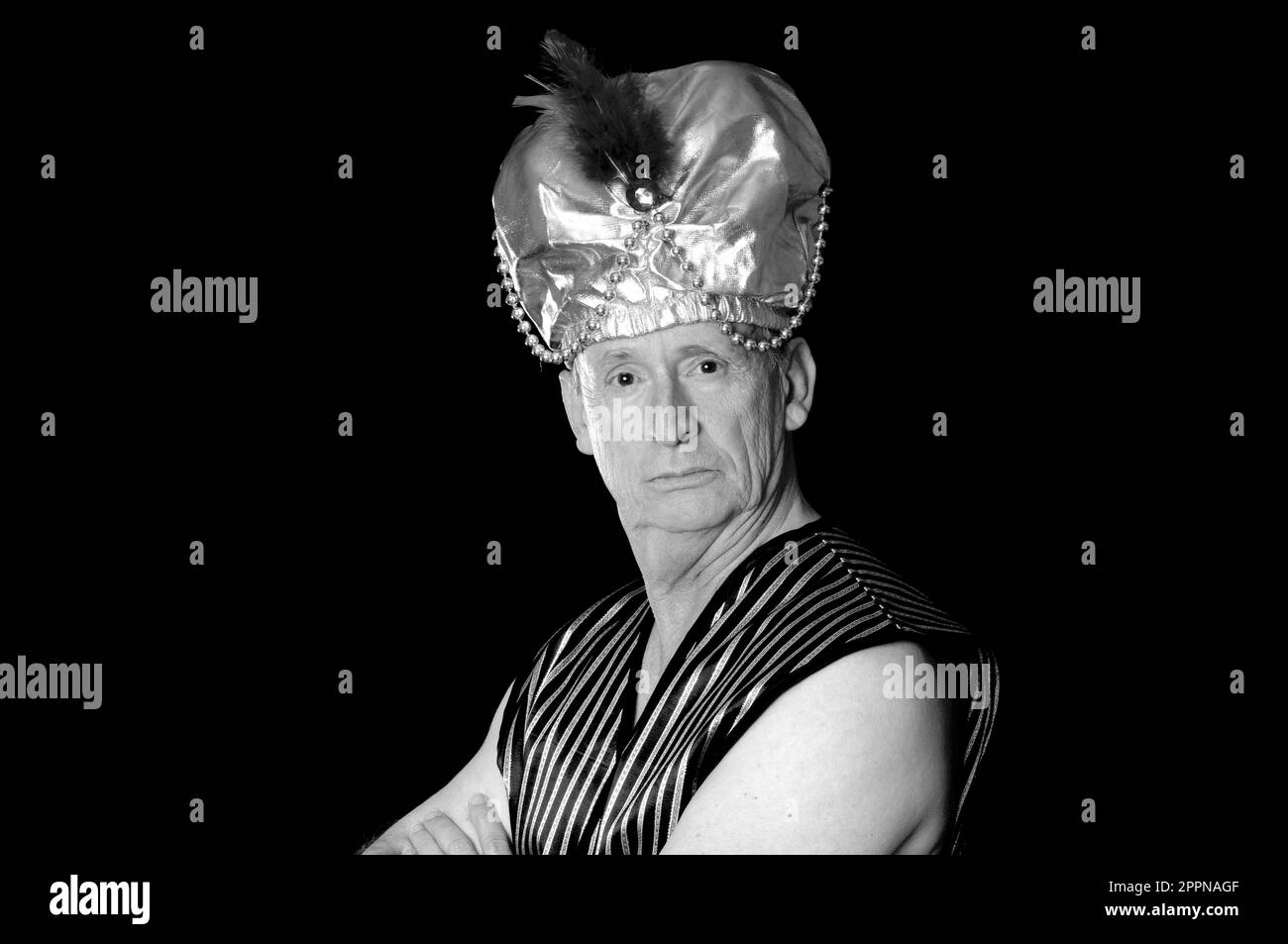 An elder sultan or shiek isolated over black Stock Photo - Alamy