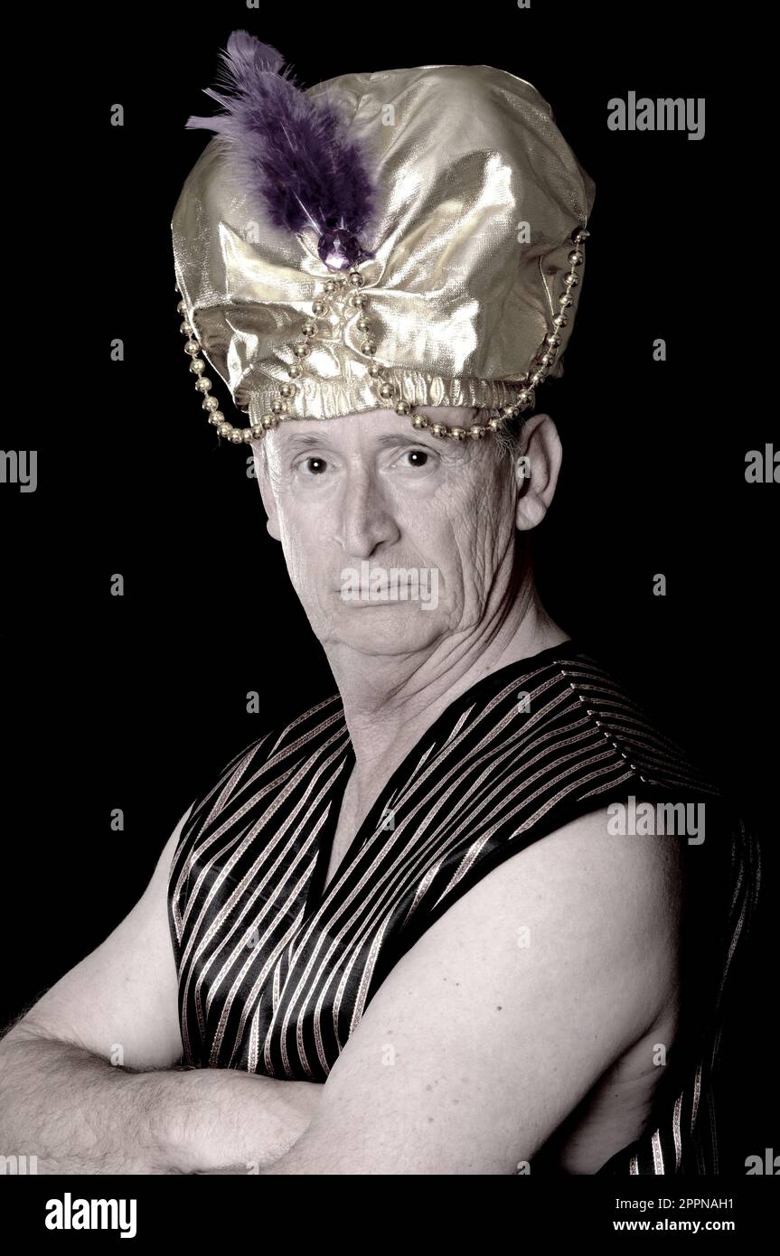 An elder sultan or shiek isolated over black Stock Photo - Alamy