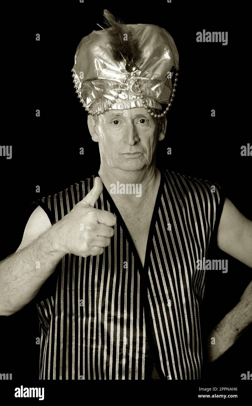 An elder sultan or shiek isolated over black Stock Photo - Alamy