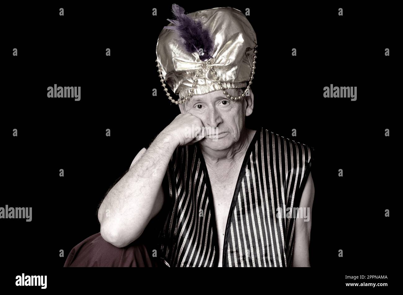An elder sultan or shiek isolated over black Stock Photo - Alamy