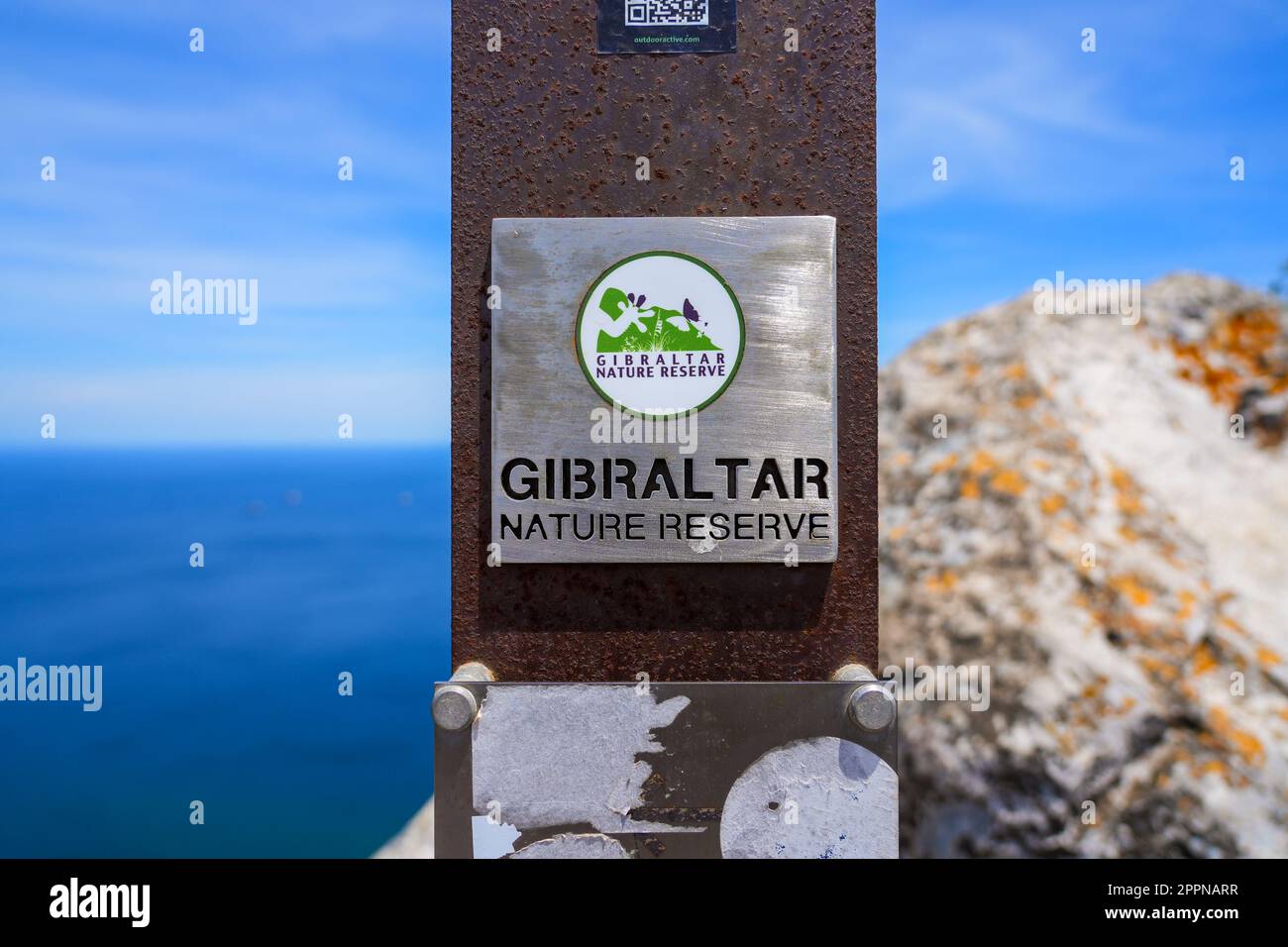 Metallic logo of the Gibraltar Nature Reserve facing the Mediterranean ...