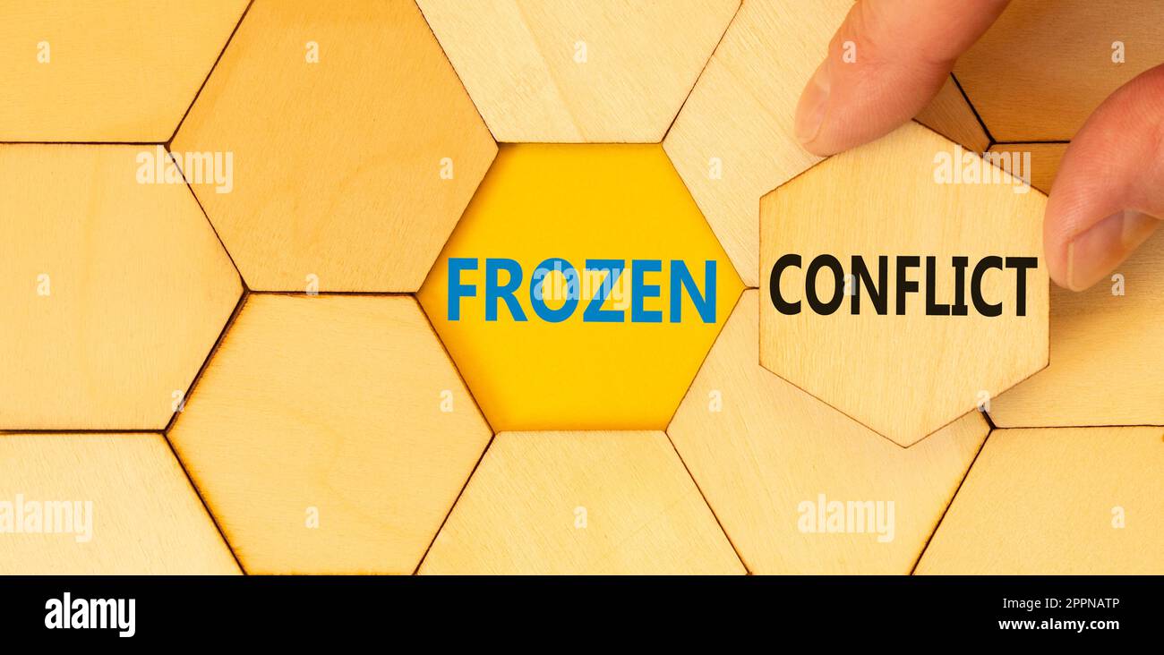 Frozen conflict symbol. Concept words Frozen conflict typed on wooden ...