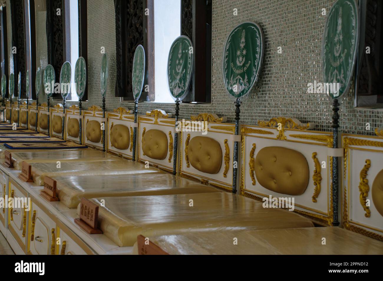 White and golden Buddhist's monk seats in Chinese temple wat Hyua Pla ...