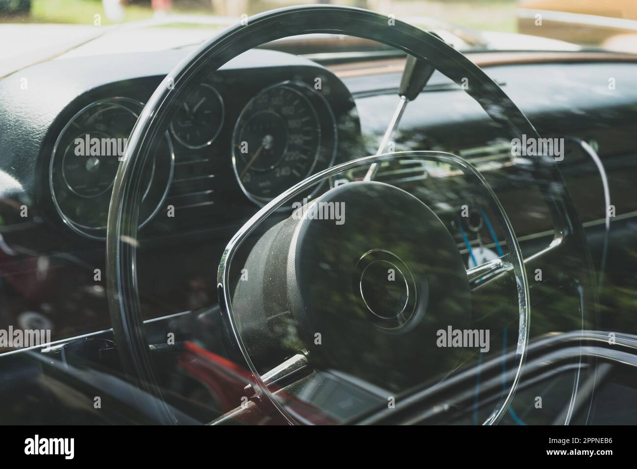 retro car dashboard interior. View of the steering wheel and dashboard ...
