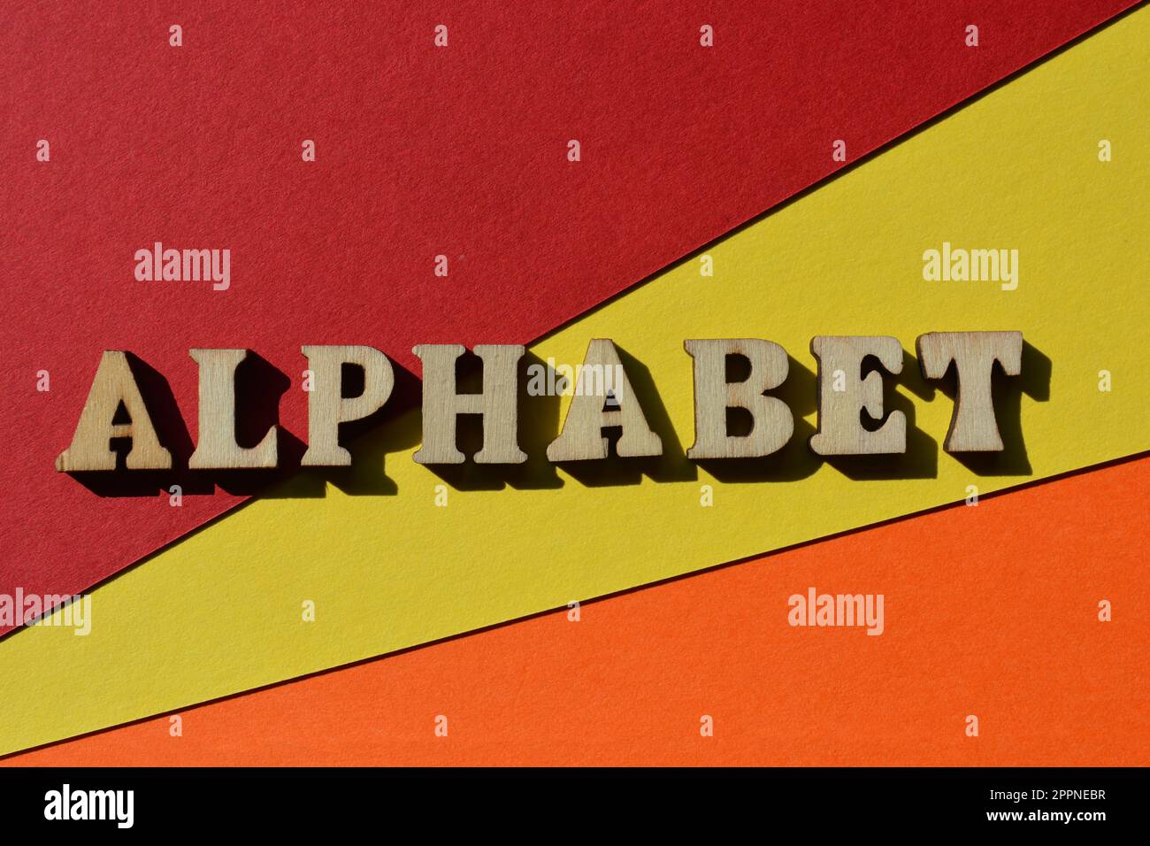 Alphabet, word in wooden alphabet letters isolated on colourful ...