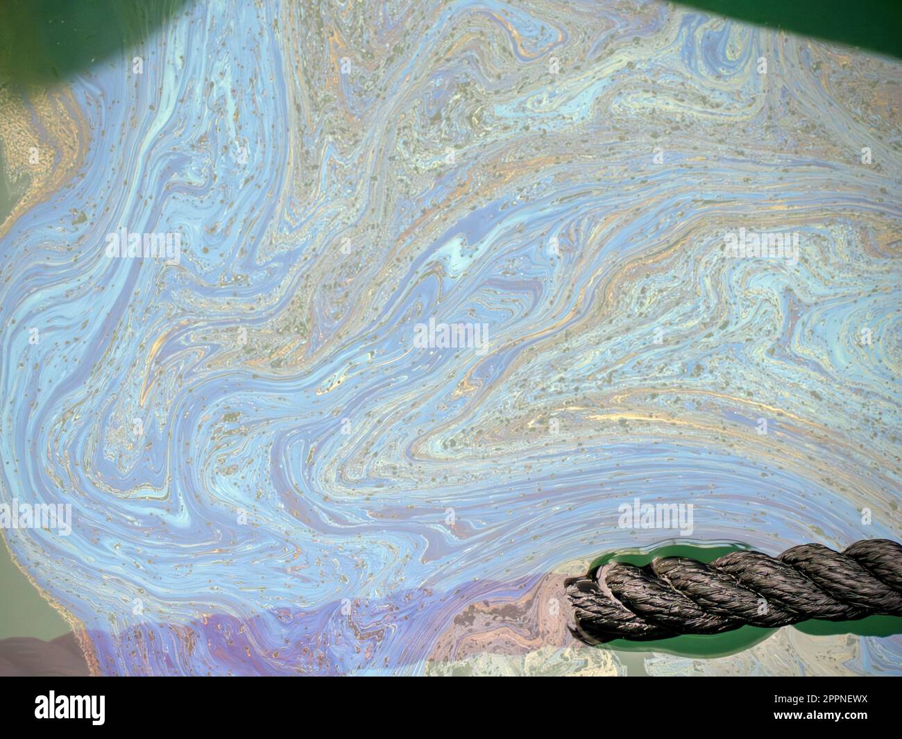 oil spreading on sea surface Aerial top down view like a abstract ...