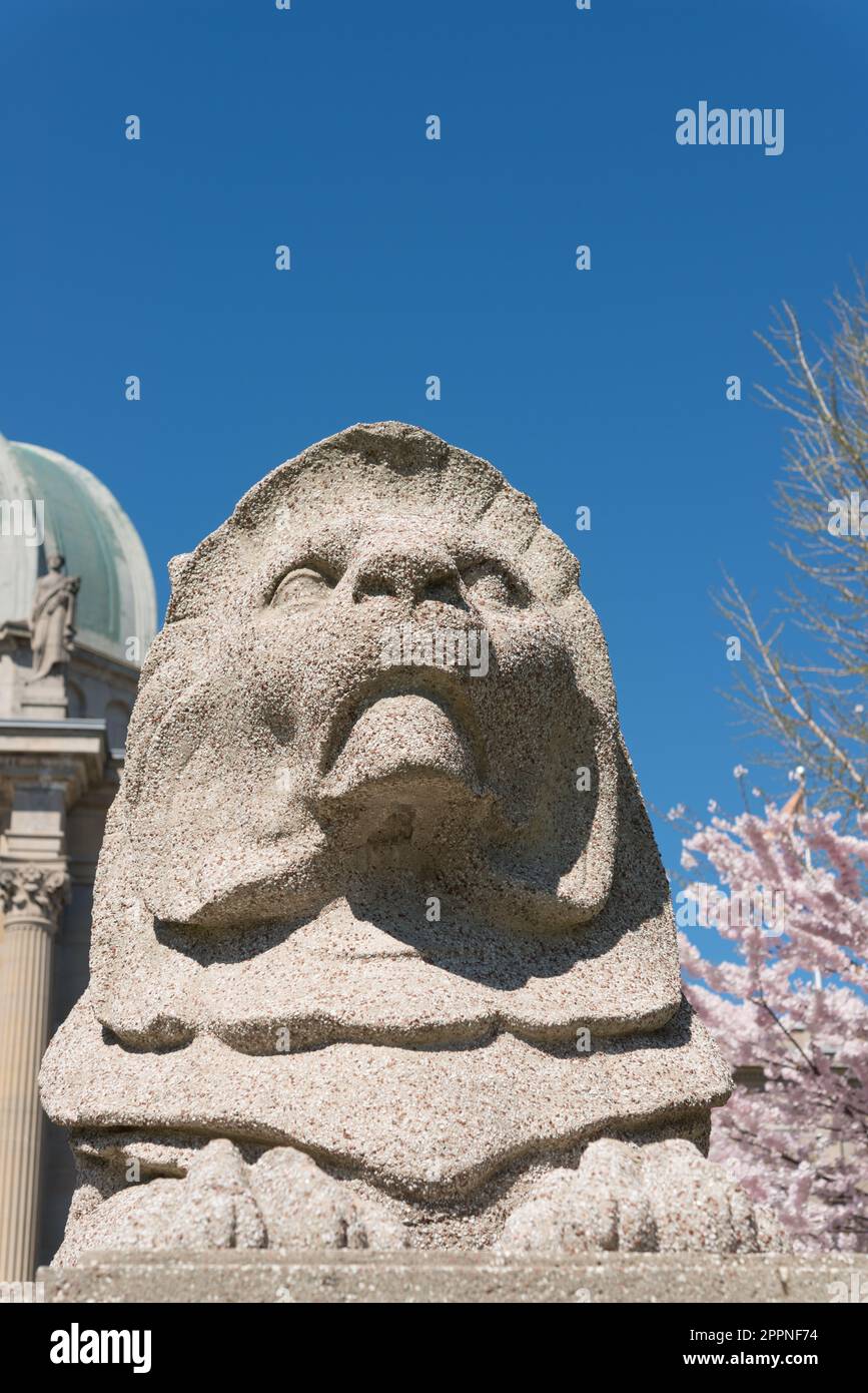 stone lion sculpture in front of a historic building at Exhibition ...