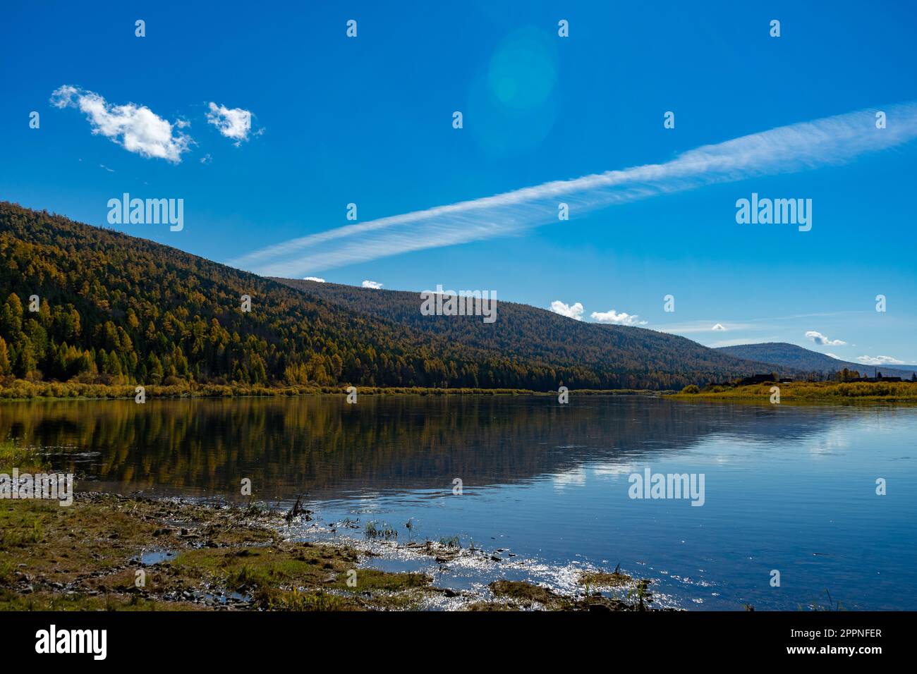 Landscape: hills covered with green forest and Lena river in Siberia ...