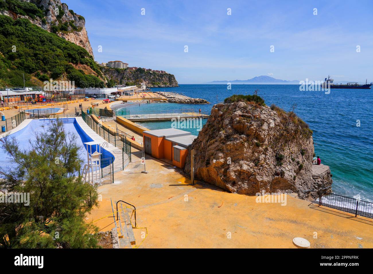Beach of Camp Bay on the western side of the Gibraltar peninsula with a ...