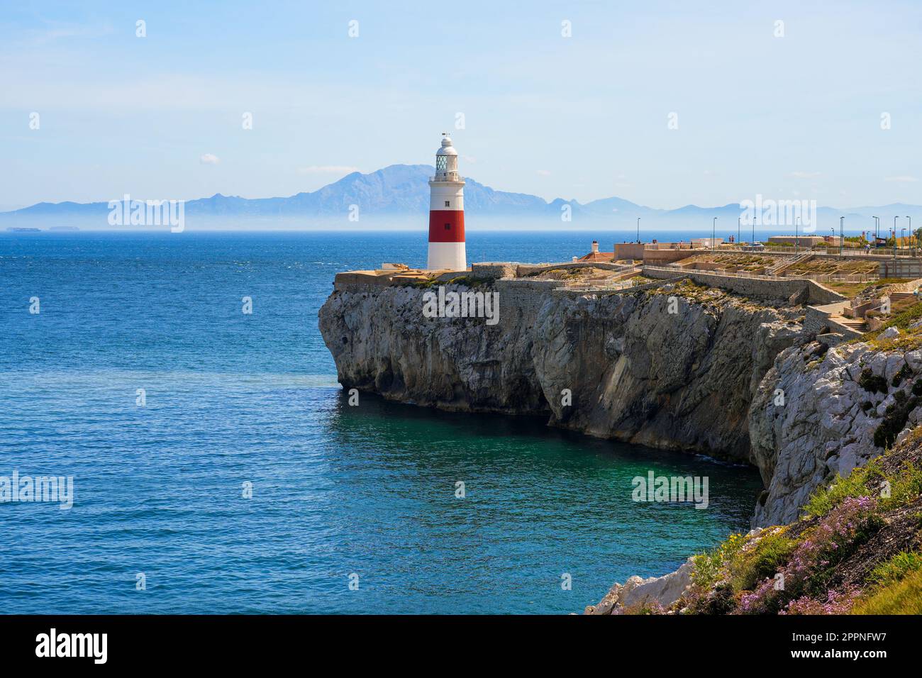 Europa Point Lighthouse facing the strait of Gibraltar on top of sea ...