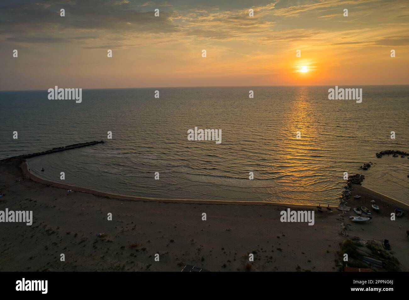Aerial view of sunset above sea by Karpen beach in Albania, Summer 2022 ...