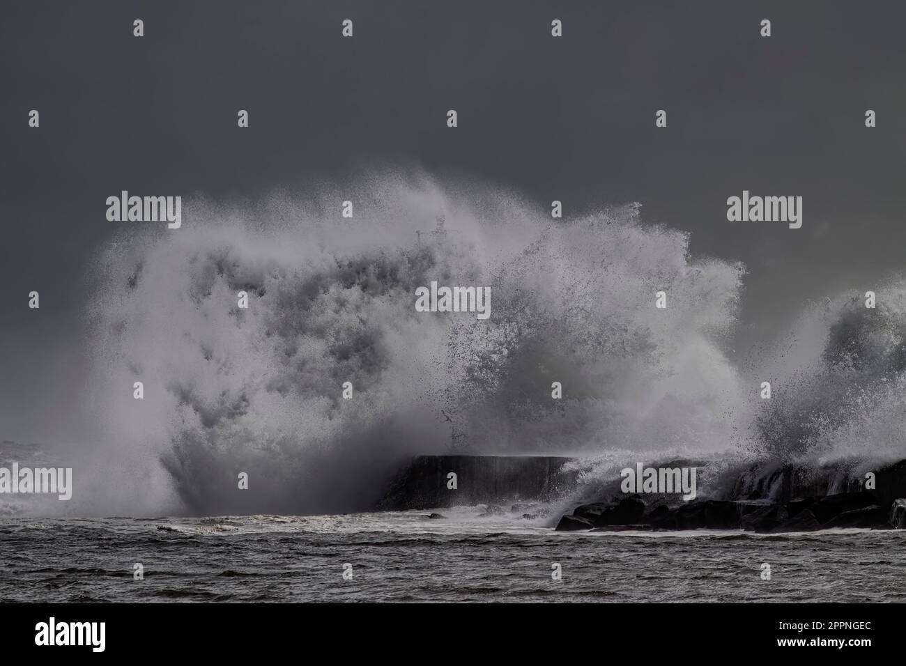 Big wave splash. Ave river mouth pier and beacon, north of Portugal ...