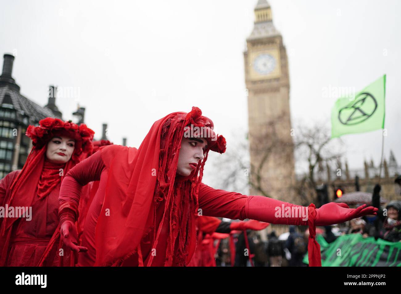 Members of the Red Rebel Brigade join demonstrators in London, on the ...