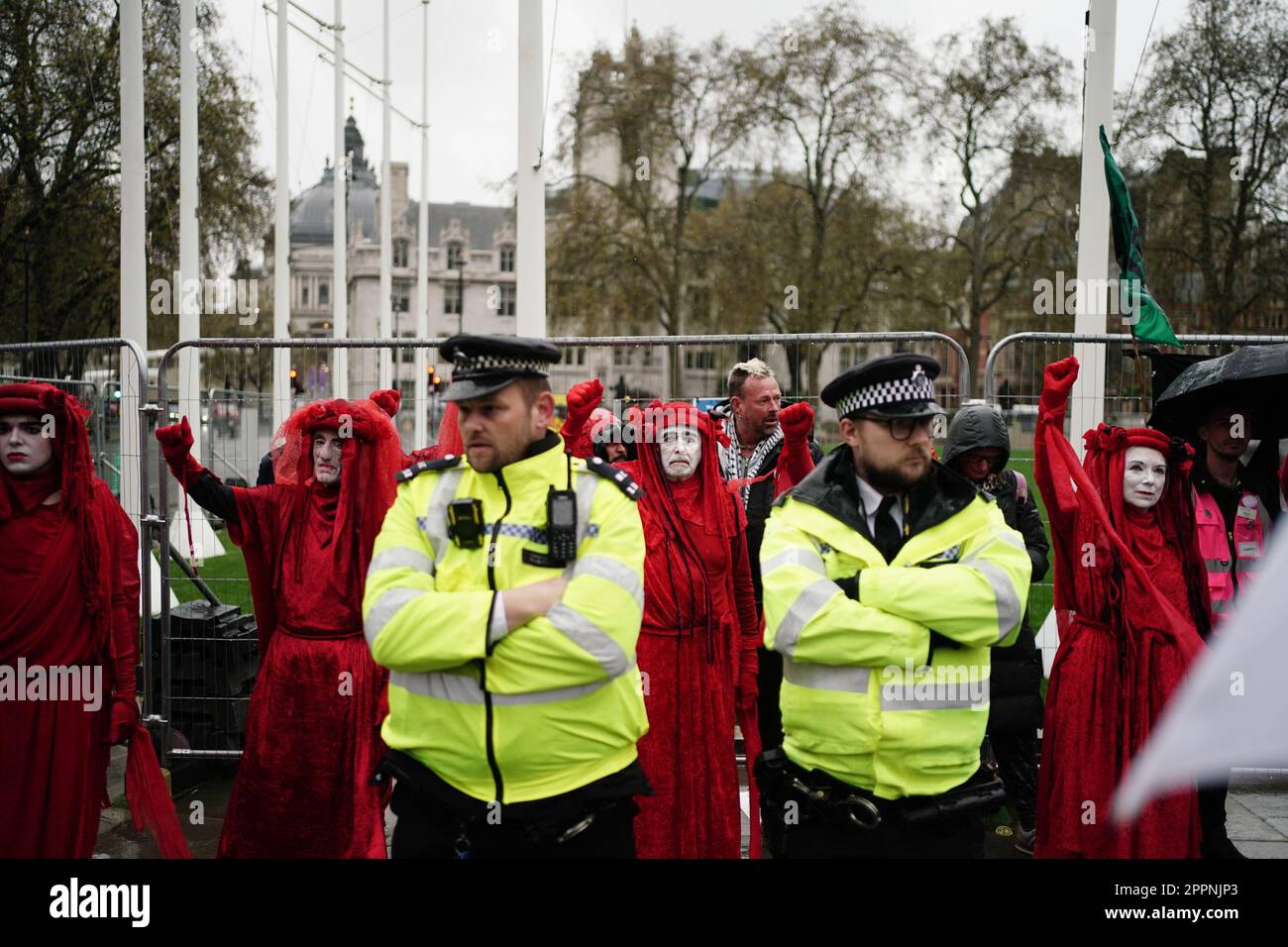 Members of the Red Rebel Brigade join demonstrators in London, on the ...