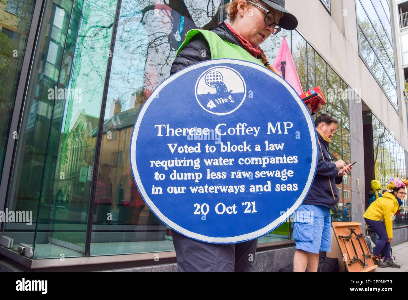London, England, UK. 24th Apr, 2023. A protester holds a mock blue ...