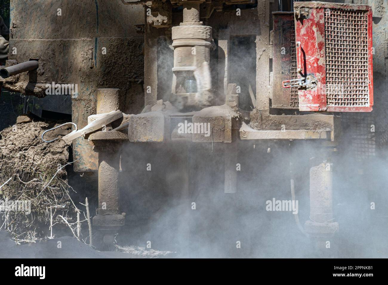 The process of drilling well with a small-depth drilling rig. There is ...