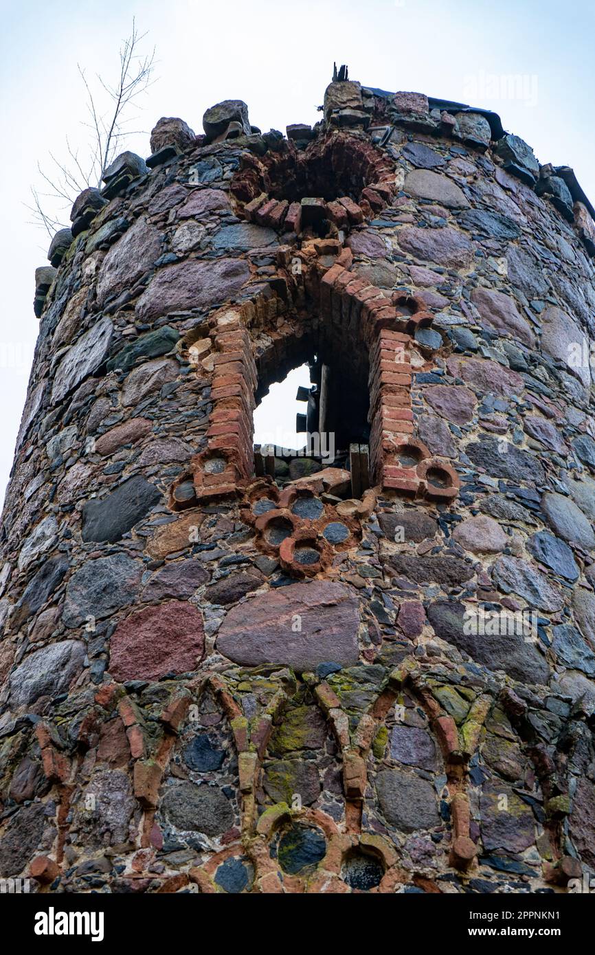 Old stone tower made of boulders and bricks Stock Photo - Alamy