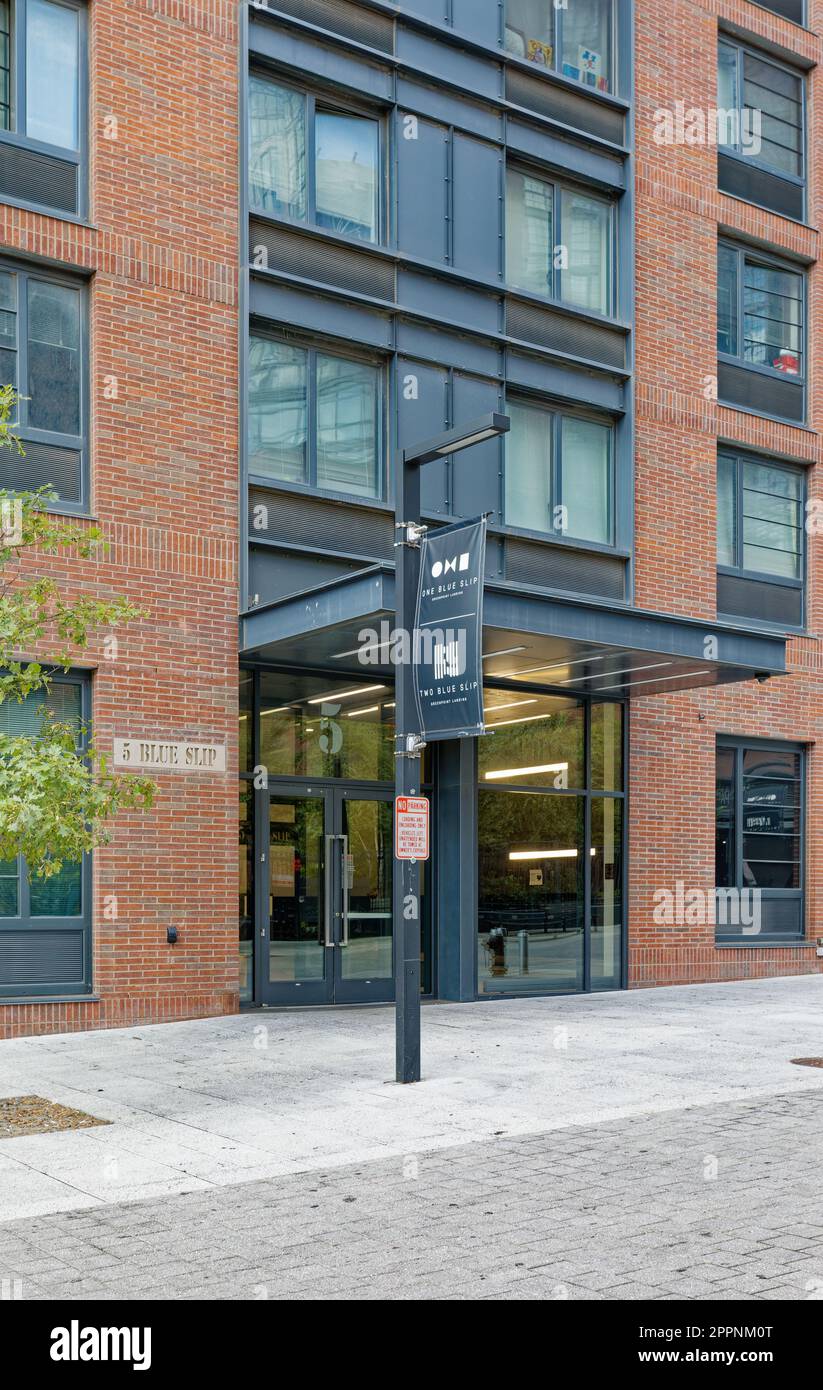 Five Blue Slip is a mid-rise brick apartment building, one of the ...