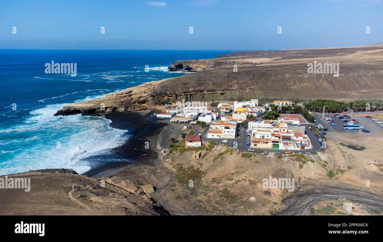 Aerial view of the small ocean side village of Ajuy on the western ...