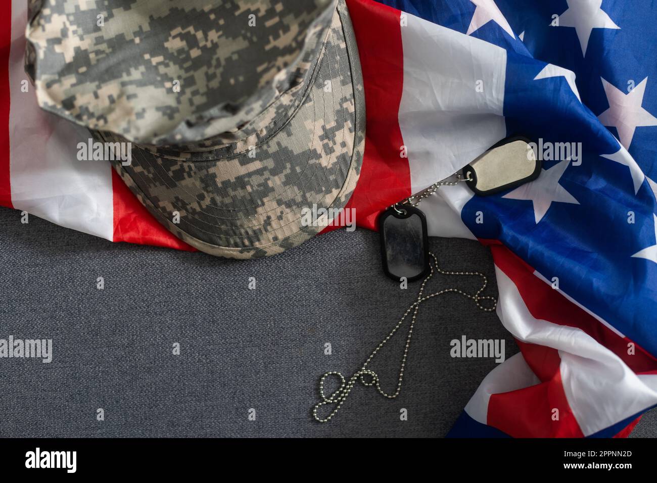 Army tokens on military uniform and USA national flag background Stock ...