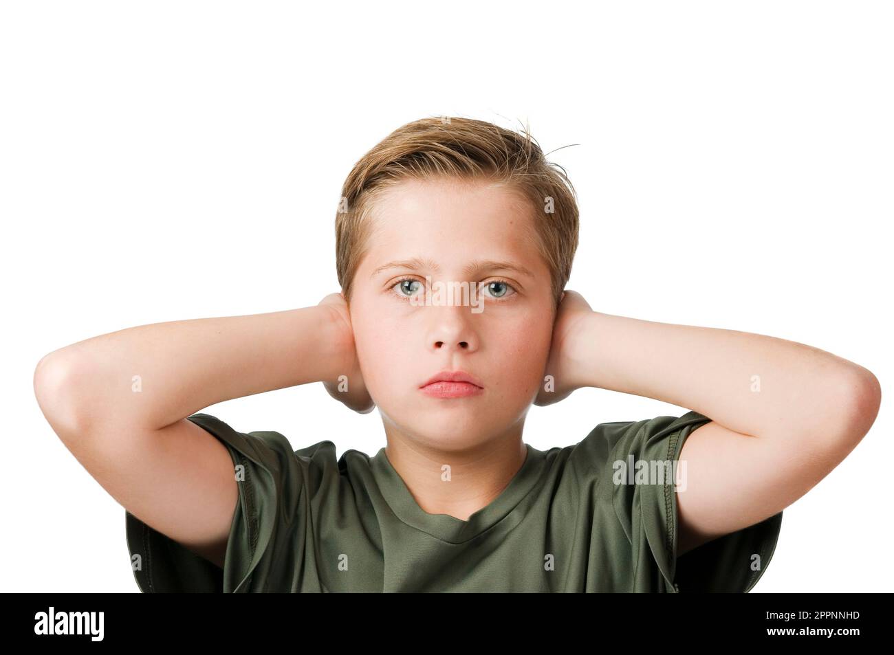Head and shoulders frontal view of a young male teenage boy in front of ...