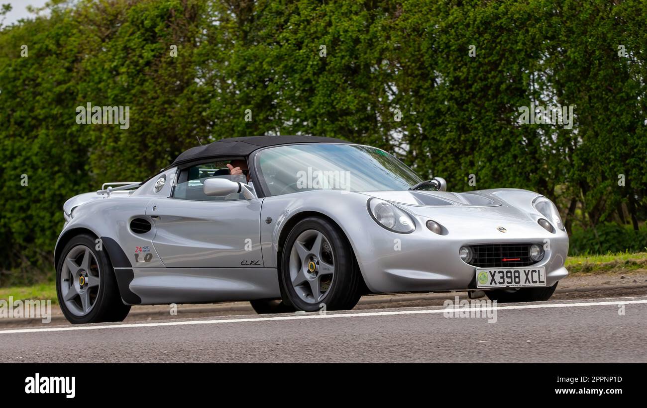 Bicester,Oxon,UK - April 23rd 2023. 2000 Lotus Elise car travelling on ...