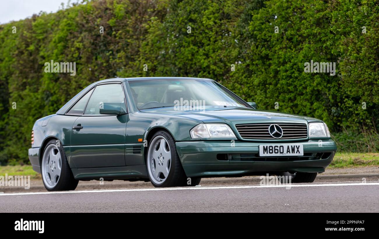 Bicester,Oxon,UK - April 23rd 2023. 1995 green Mercedes SL car ...