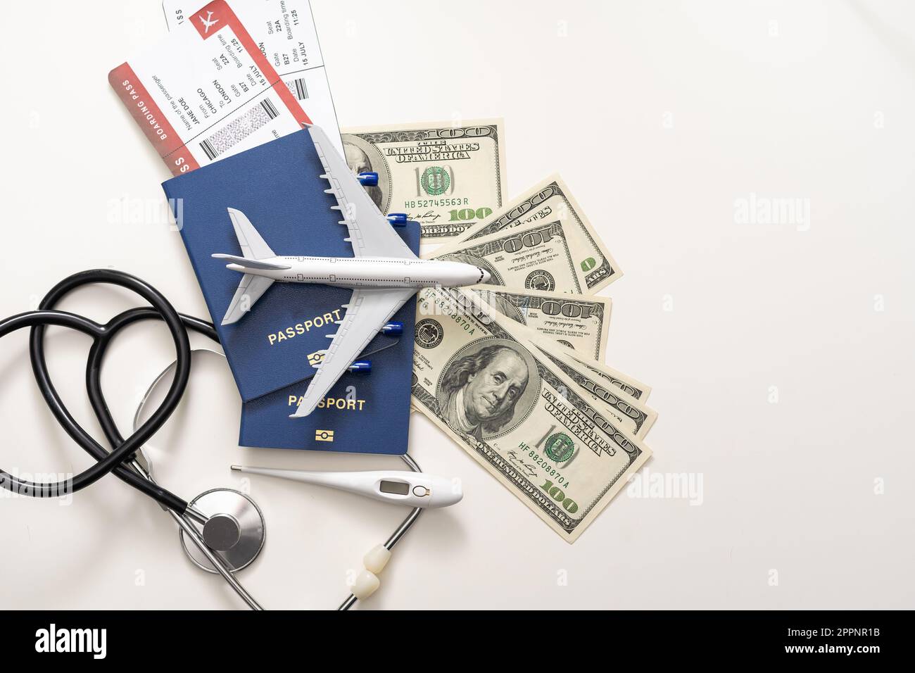 Miniature figures of paramedic personnel attending sick person in a ...