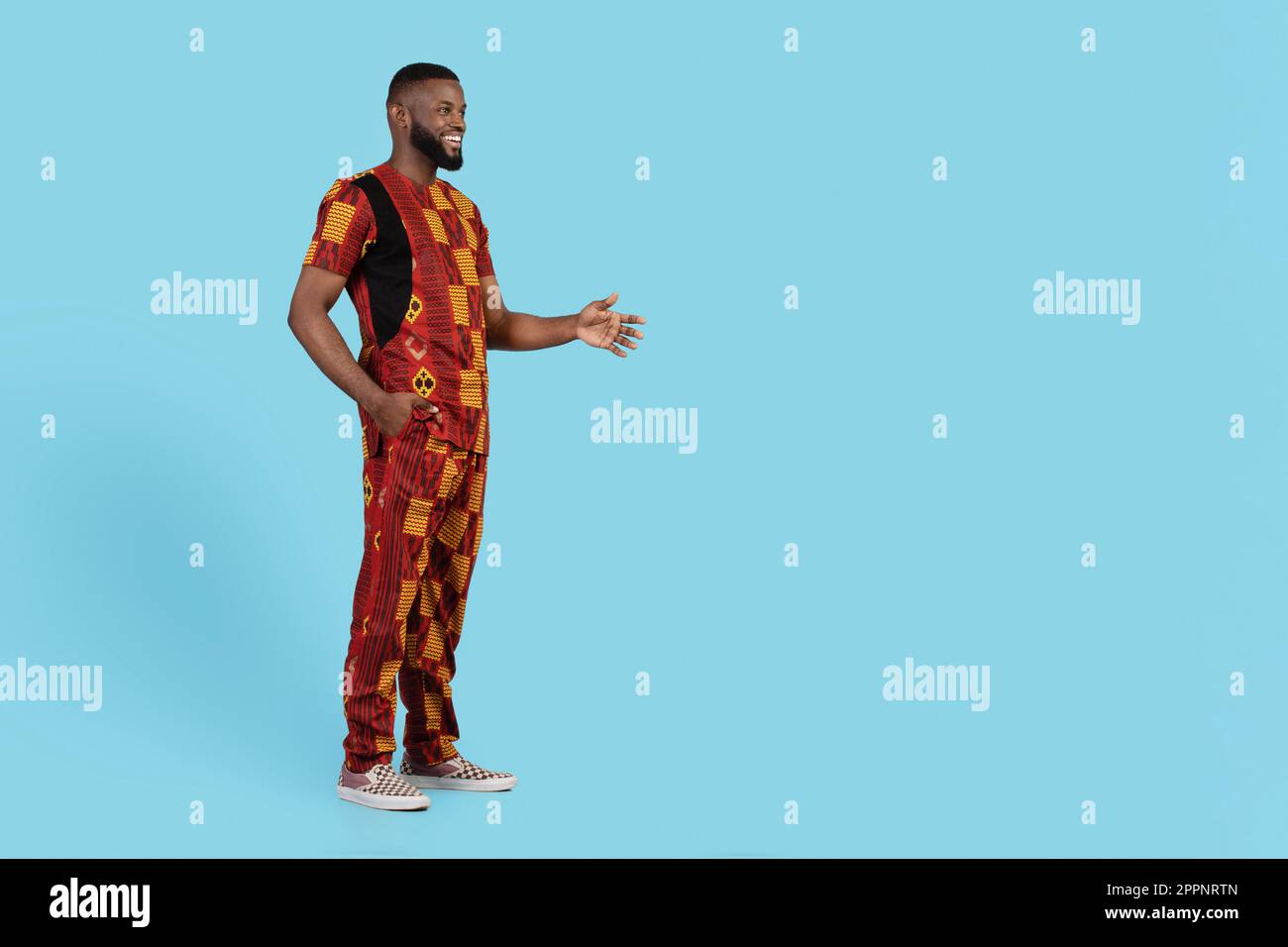 Handsome Black Man In Traditional African Costume Giving Hand For ...