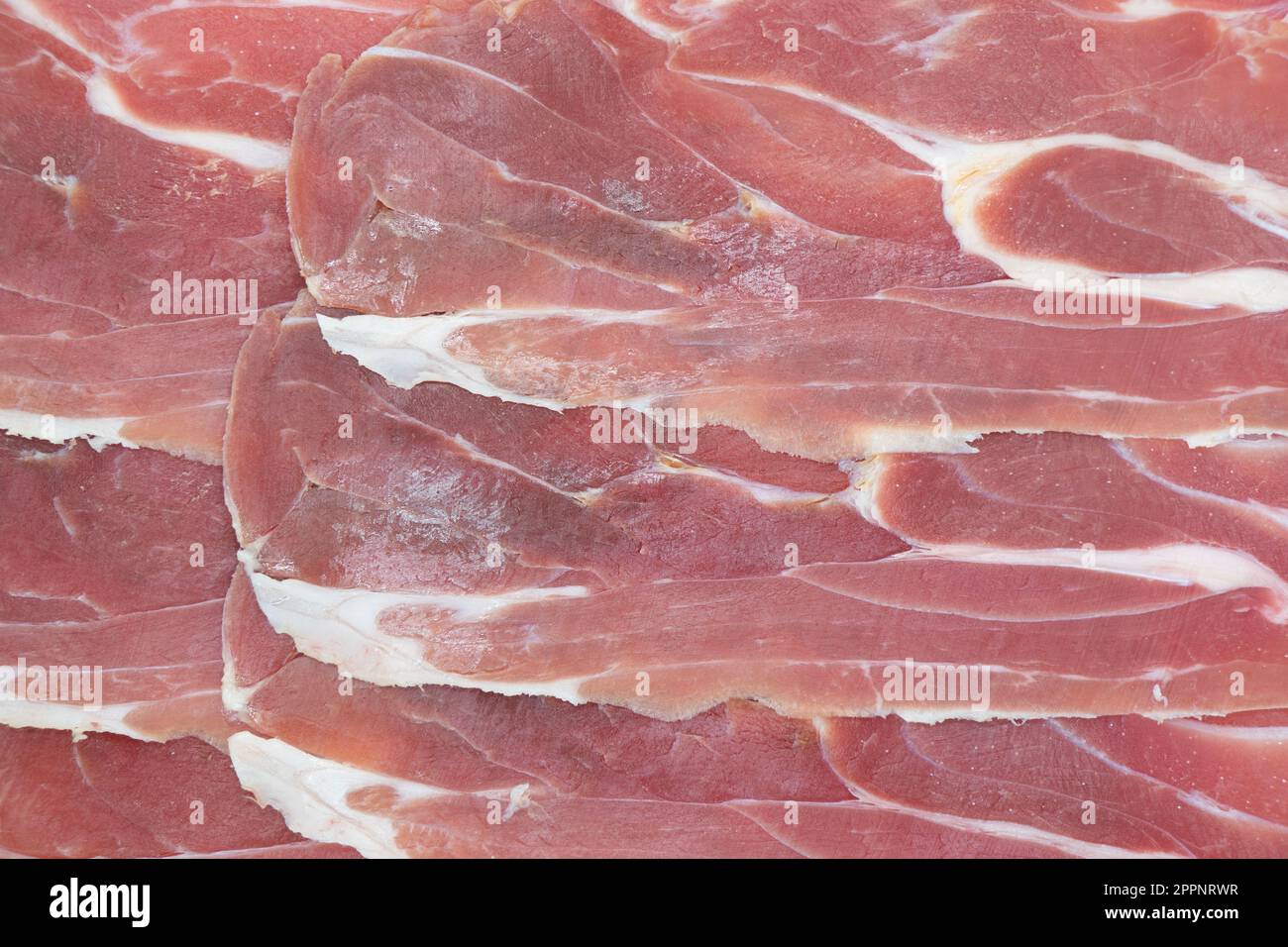 Jamon serrano. A Spanish ham texture background. Traditional spanish ...
