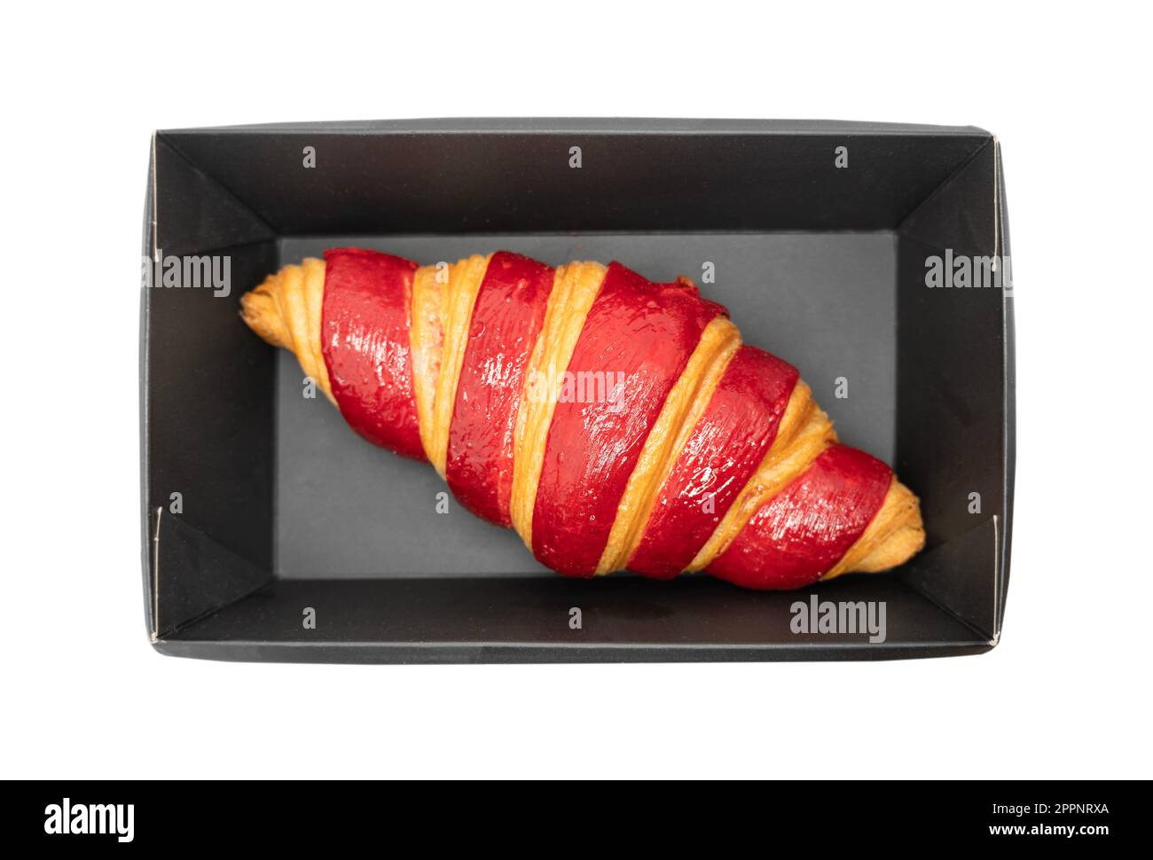 Fresh baked croissant in paper box isolated on white background ...