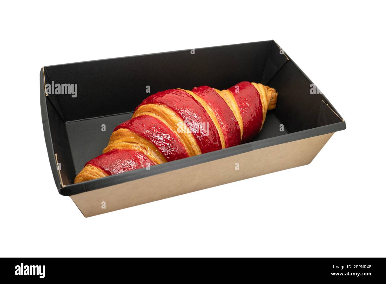 Fresh baked croissant in paper box isolated on white background ...
