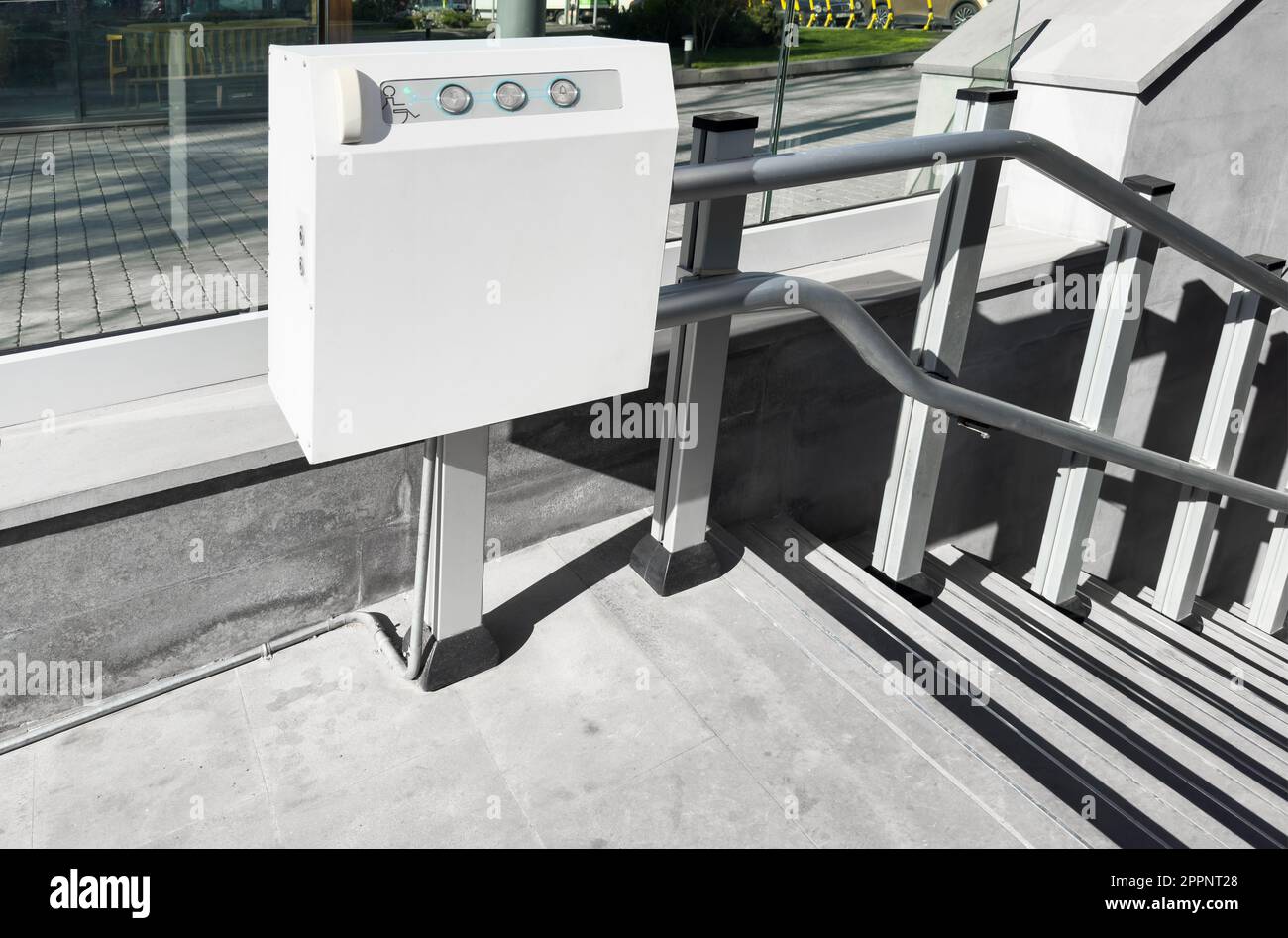 A lift-out lift for the disabled near the entrance. Automatic stair ...