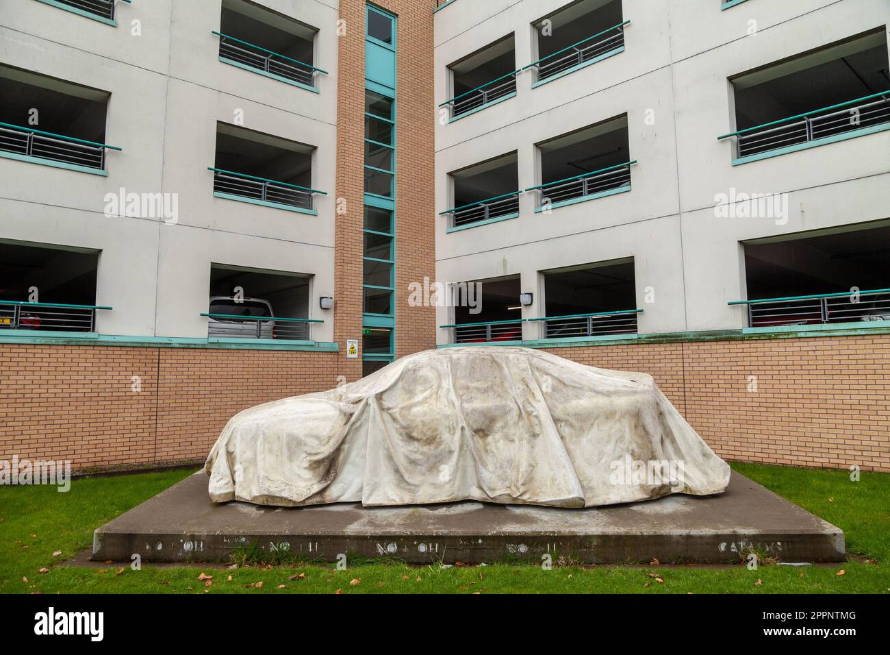 Catalyst Car Sculpture a draped life-sized car that has been cast in ...