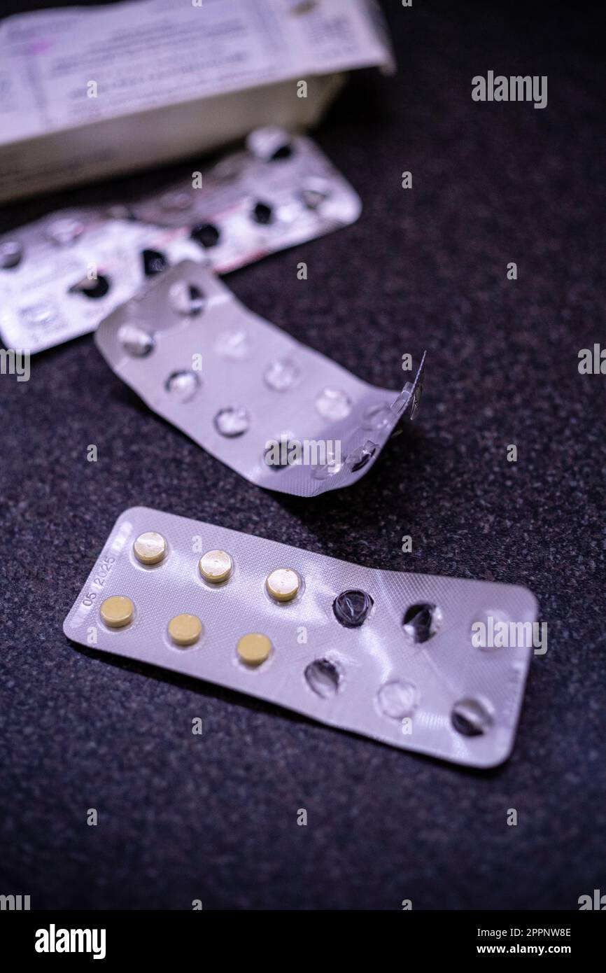 Pill packets discarded on worktop rubbish Stock Photo - Alamy