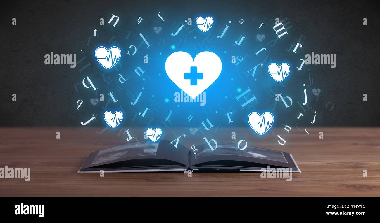 Open medical book with health icons above Stock Photo - Alamy