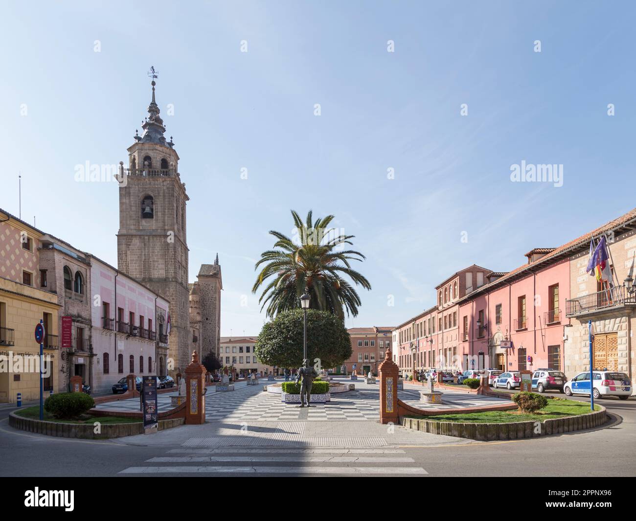 view of the plaza del pan, with the tower of the collegiate church in ...