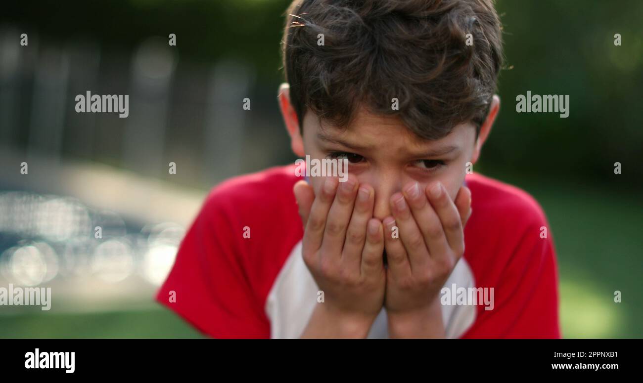 Child changing emotions, going from happy to upset and sad Stock Photo ...