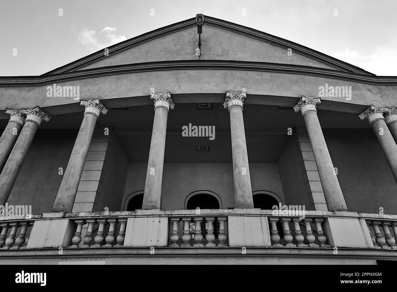 Columns and frontage of a historic neoclassical building in Poznan ...
