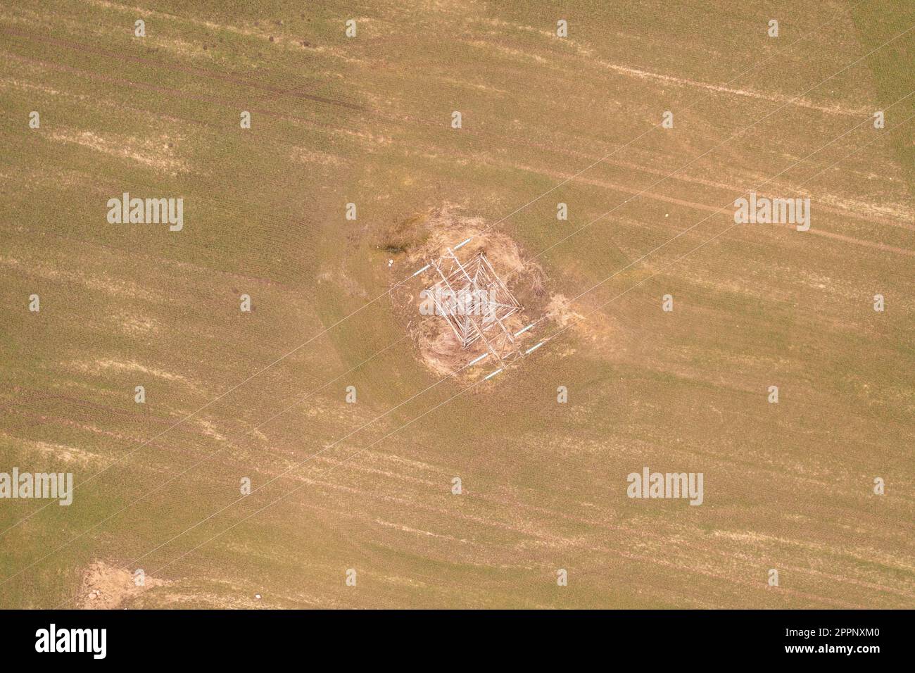 Drone top down view of high voltage electrical line and steel ...