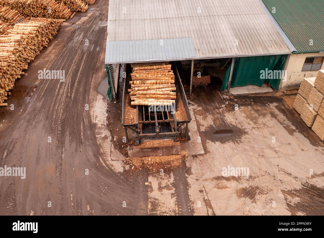 Drone footage of sawmill, machinery and lumber during summer day. High ...