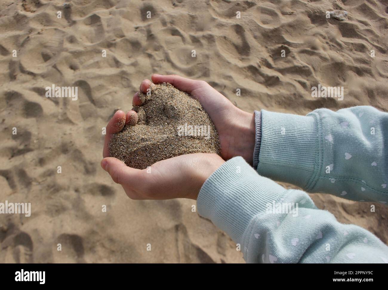 Sand heart on the beach Stock Photo - Alamy