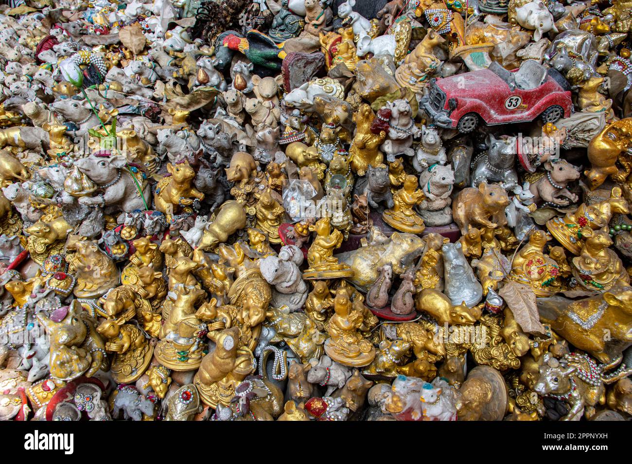 Figurines of rats from Buddhist mythology in a pile Stock Photo - Alamy