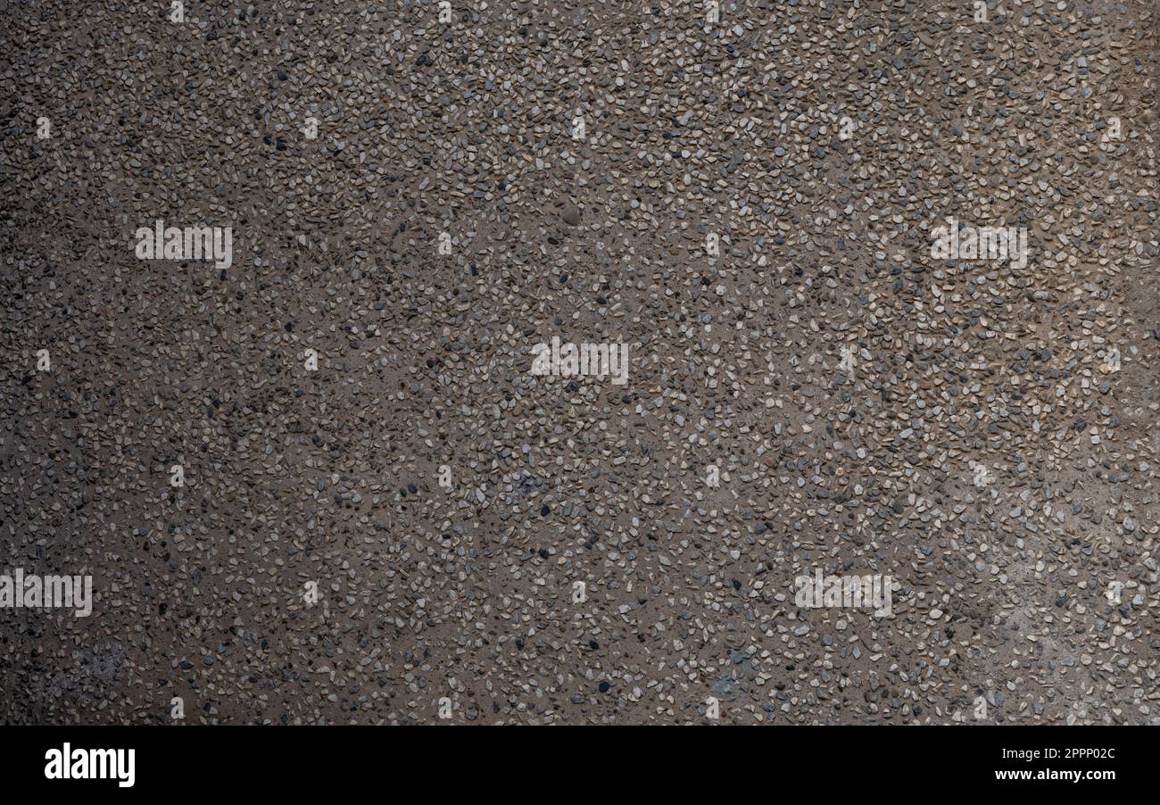 Crushed stone in concrete texture Stock Photo - Alamy