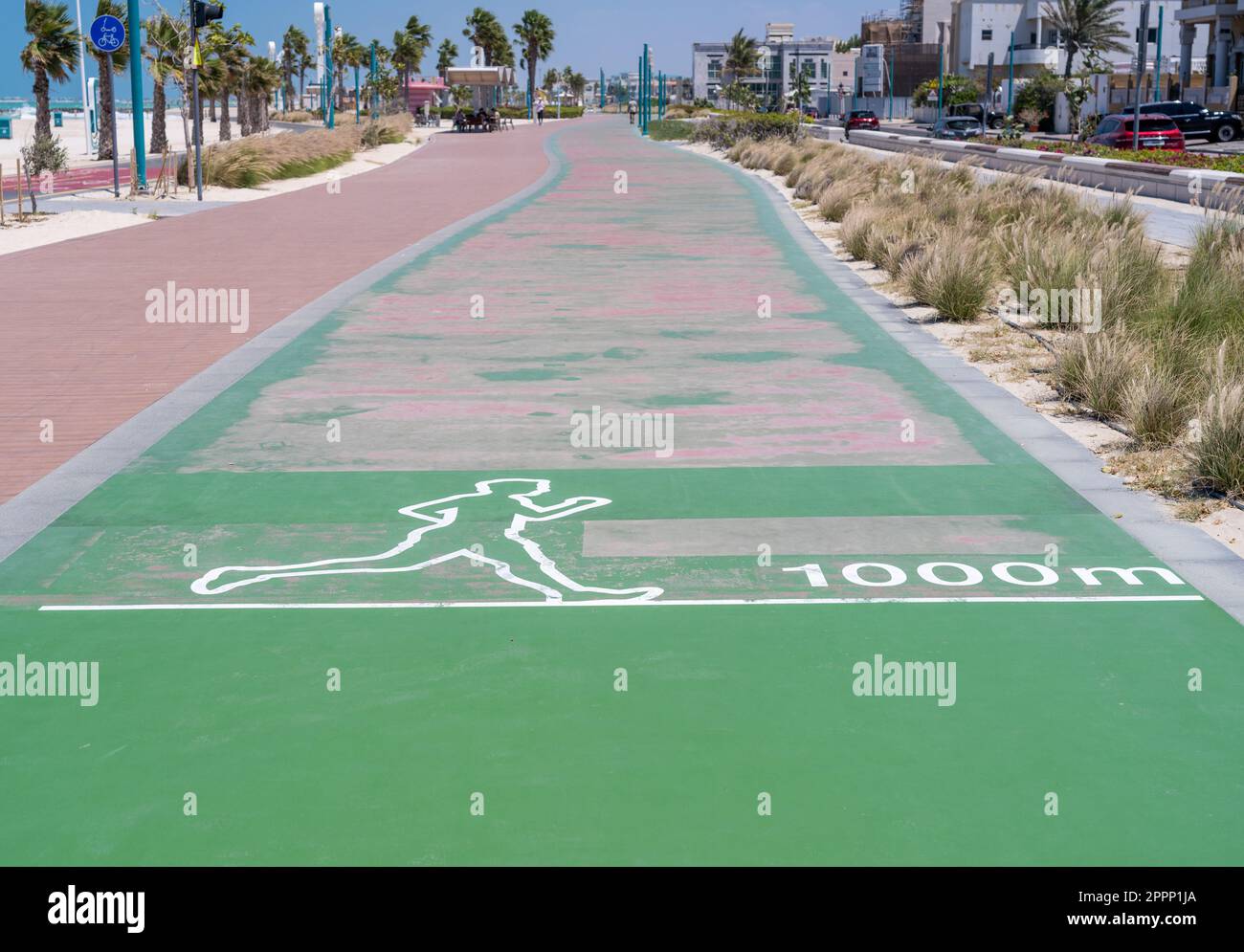 Jogging sign for the green Zero Point running track at Jumeirah public ...